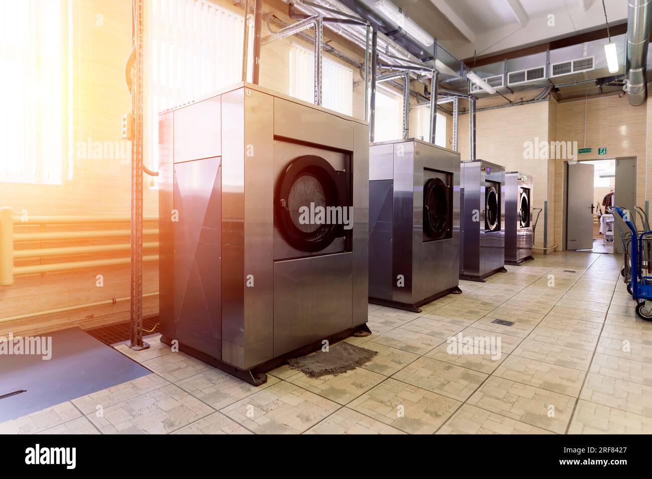 Industrial Washing in public shop, business and laundry Stock Photo - Alamy
