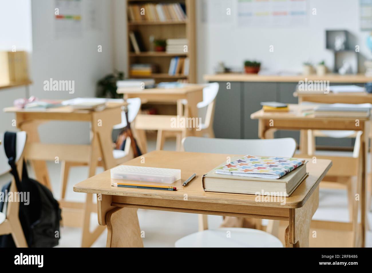 Empty classroom with desks and books at school Stock Photo - Alamy