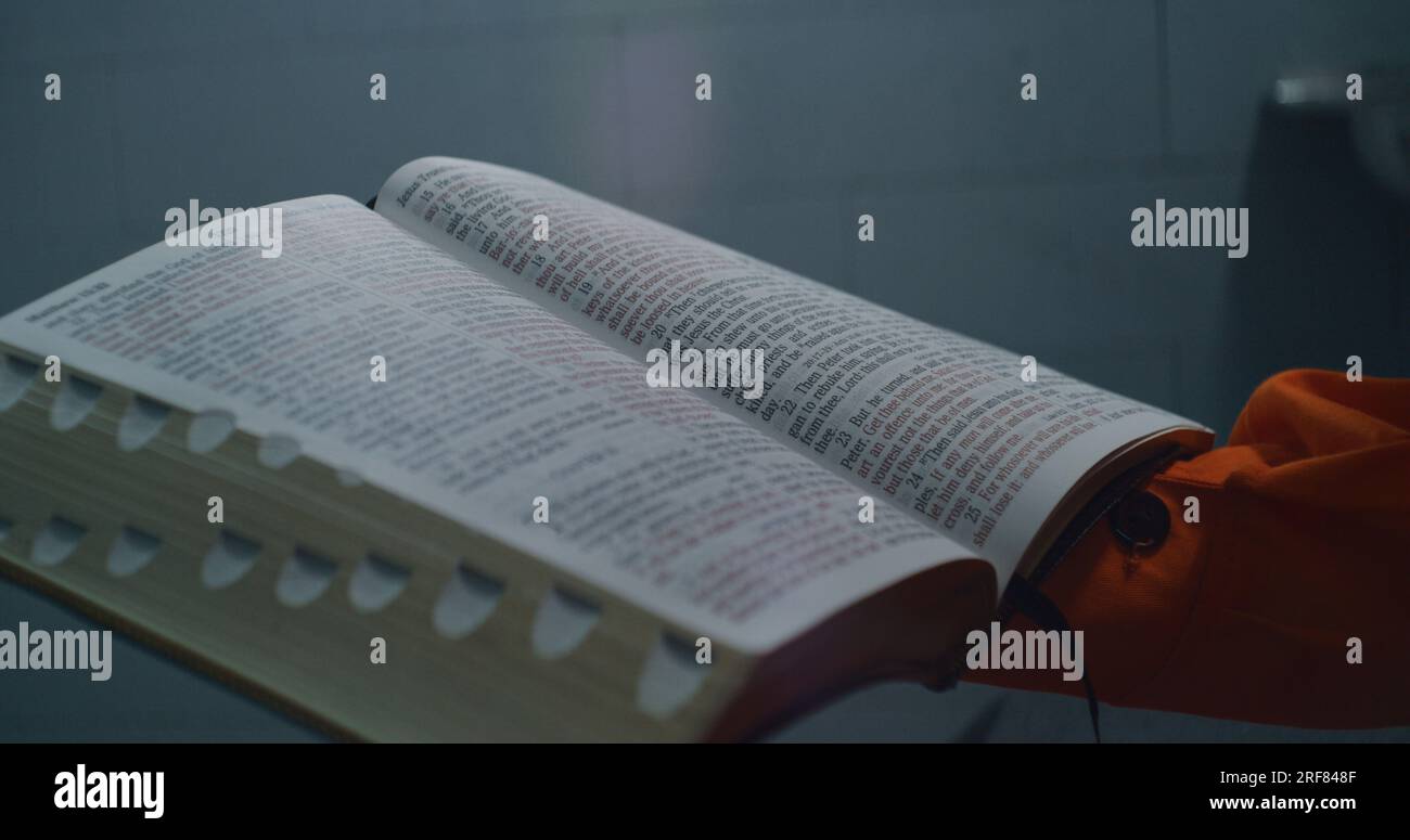 Man holds bible in hand hi-res stock photography and images - Alamy