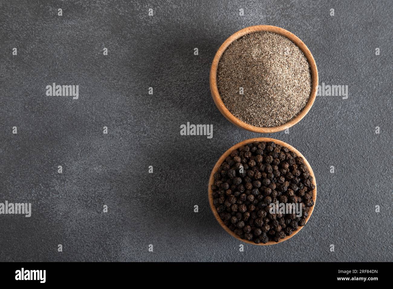 Ground black pepper with grains of black pepper,top view Stock Photo ...