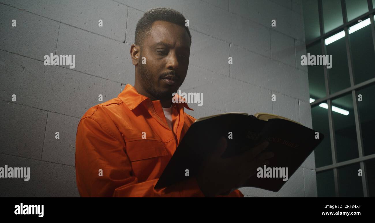 Man sits in jail cell hi-res stock photography and images - Alamy