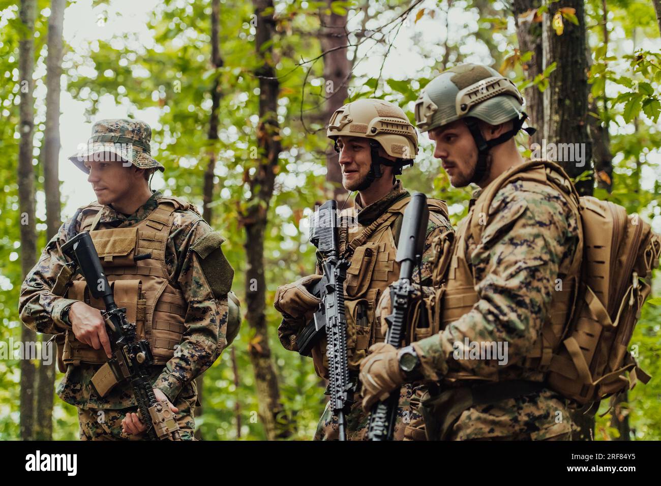 Modern warfare Soldiers Squad Running as Team in Battle Formation Stock ...