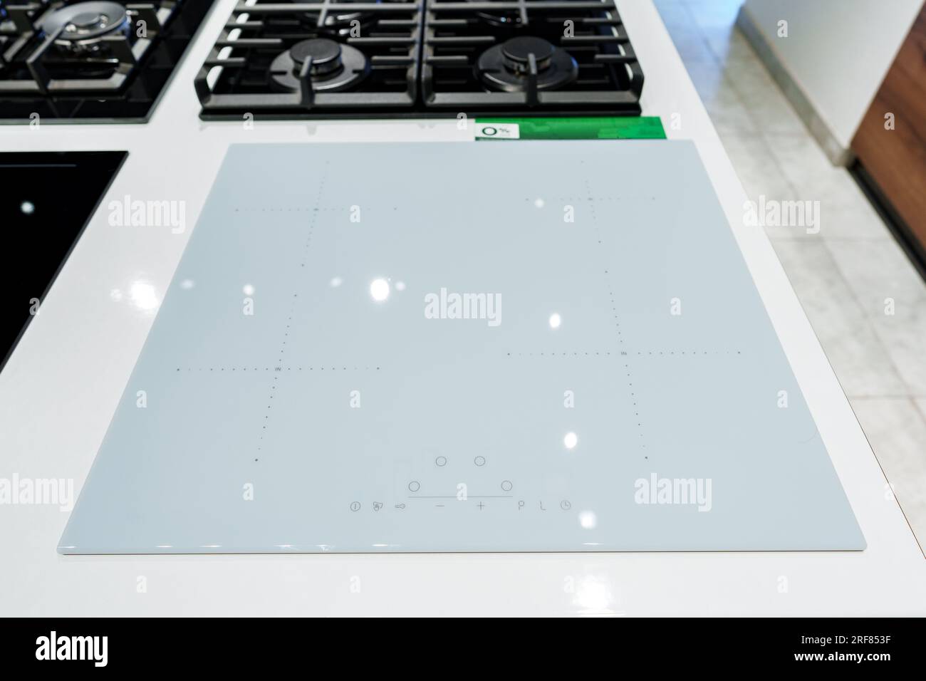 Modern cooking stoves on display in the store Stock Photo - Alamy