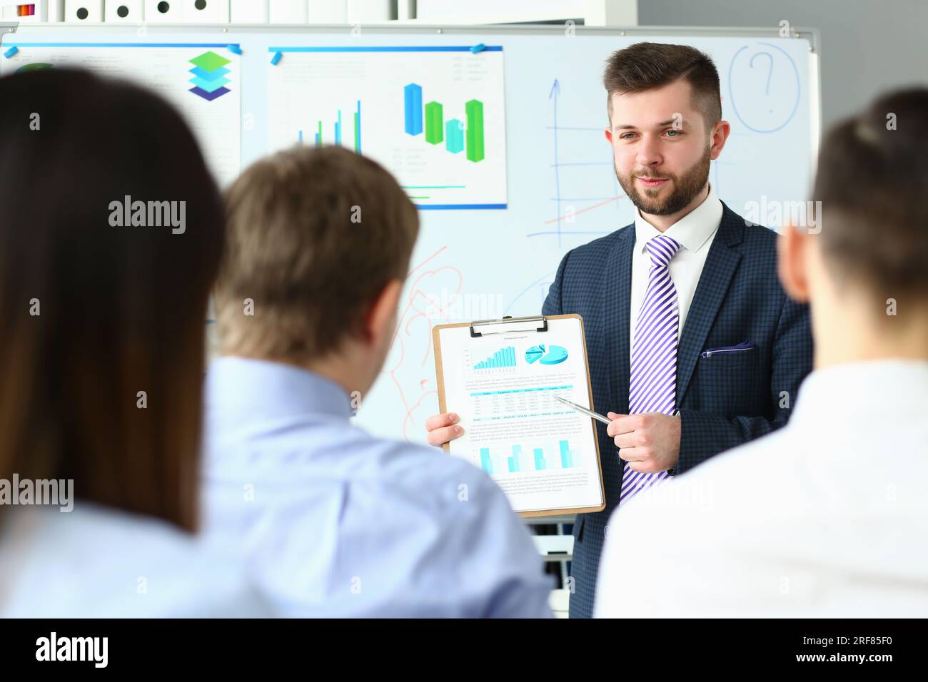 Business coach conducts staff training on effective business ...