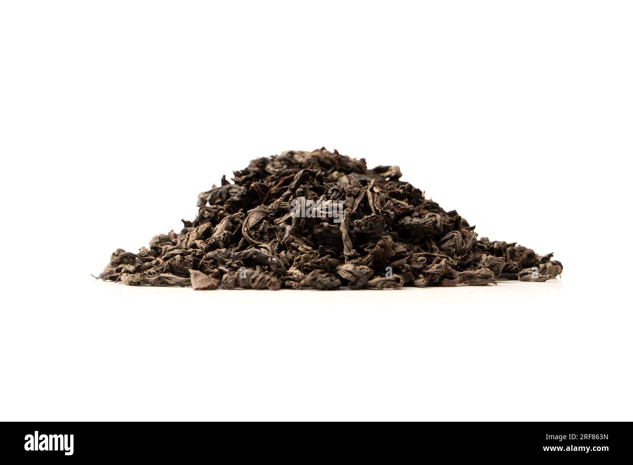 Dried tea leaves isolated on a white background. Top view Stock Photo ...