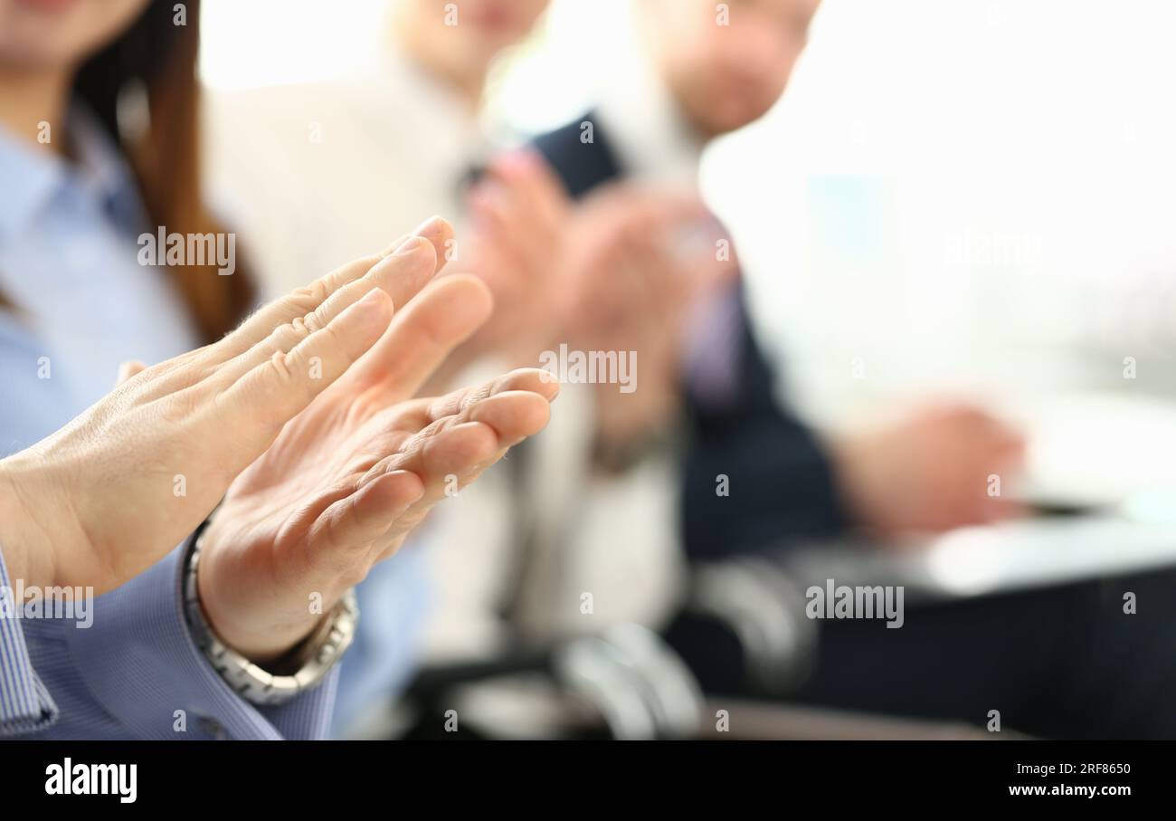 Audience hands applauding speaker and host for speaking Stock Photo - Alamy