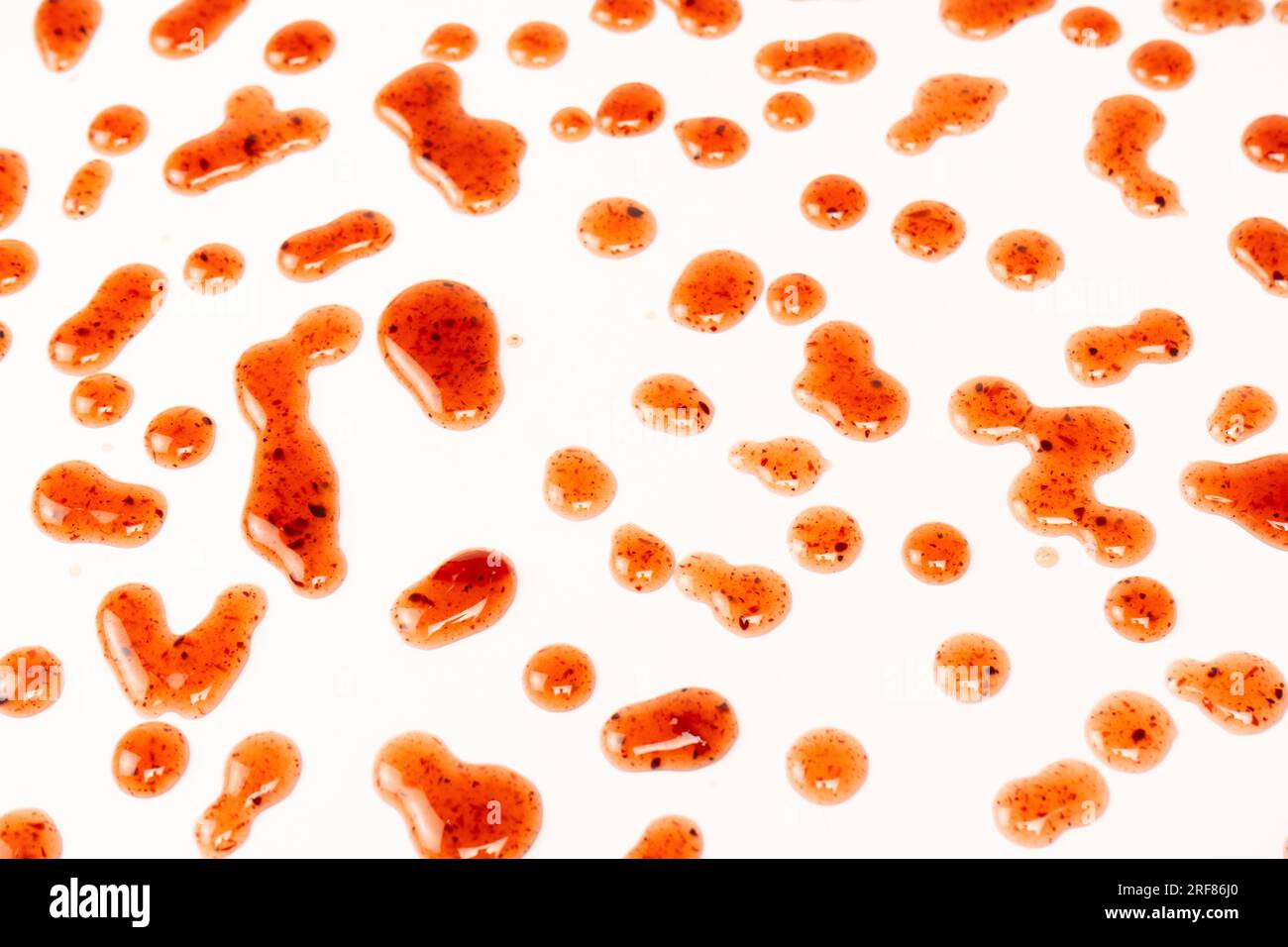 Red jam splashes isolated on a white background. Top view Stock Photo ...
