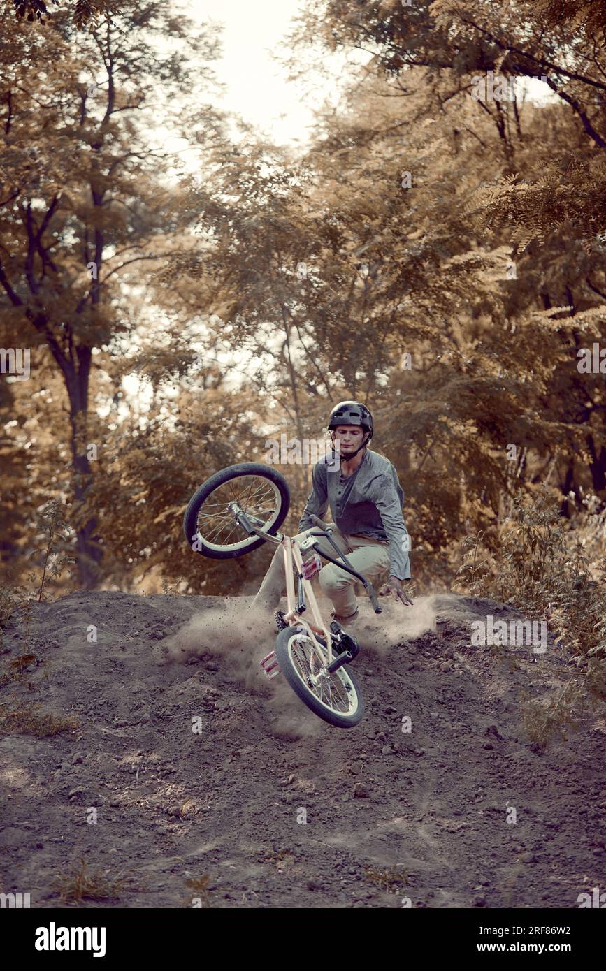 Boy riding his bmx in forest hi-res stock photography and images - Alamy