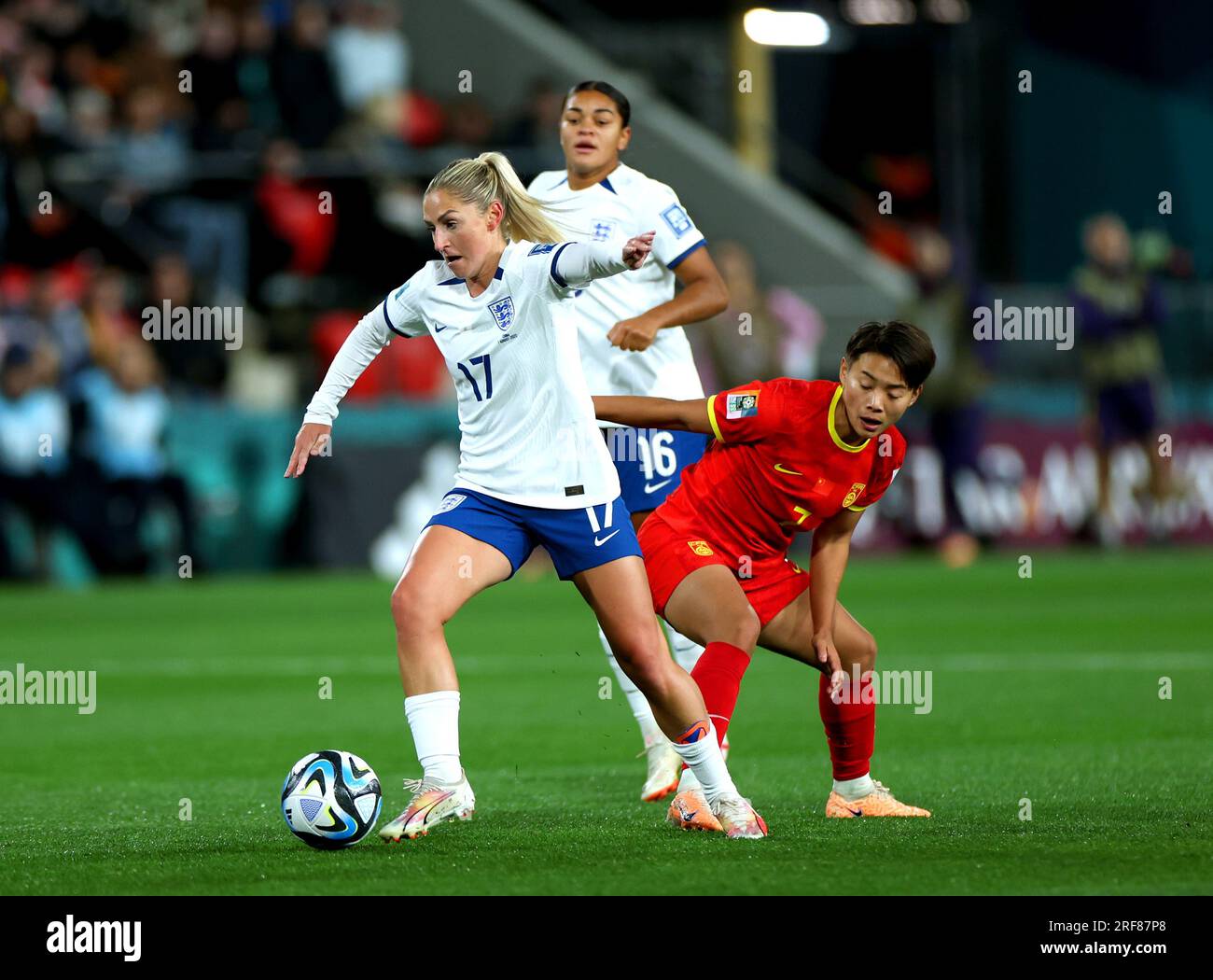 England's Laura Coombs (left) and China's Wang Shuang battle for the ...