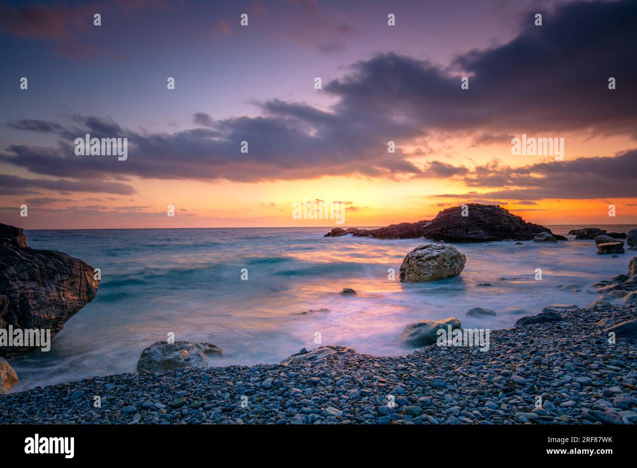 Sea Ocean. Sunrise time at the sea. Big roks. Wave hit the rock at ...