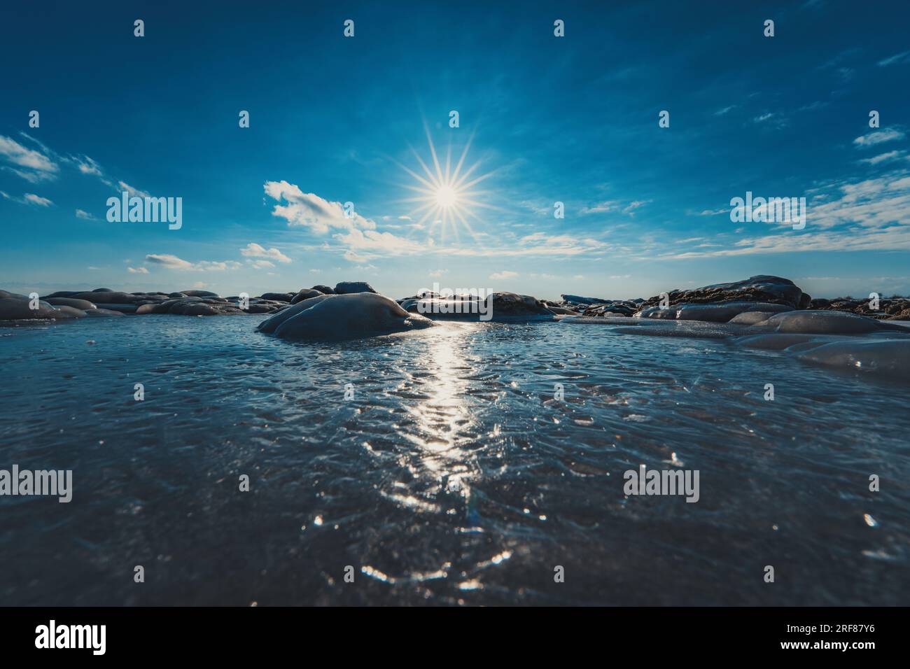 Frozen water in lake at cold winter weather, Kyrgyzstan, Issyk-Kul ...