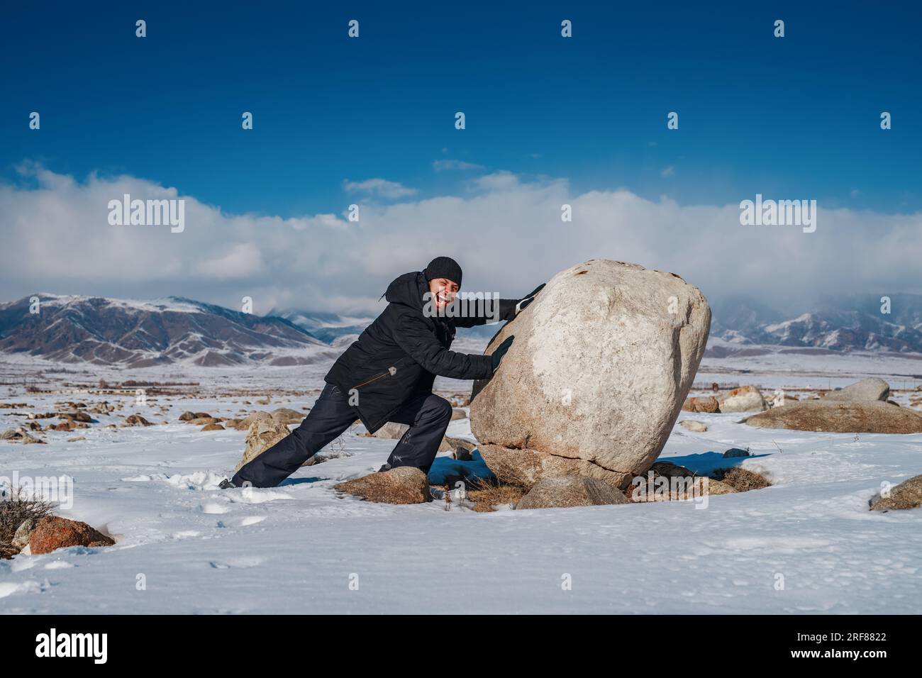 Man with rock white background hi-res stock photography and images - Alamy