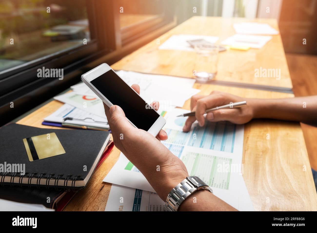 Businessman cell phone plane hi-res stock photography and images - Alamy