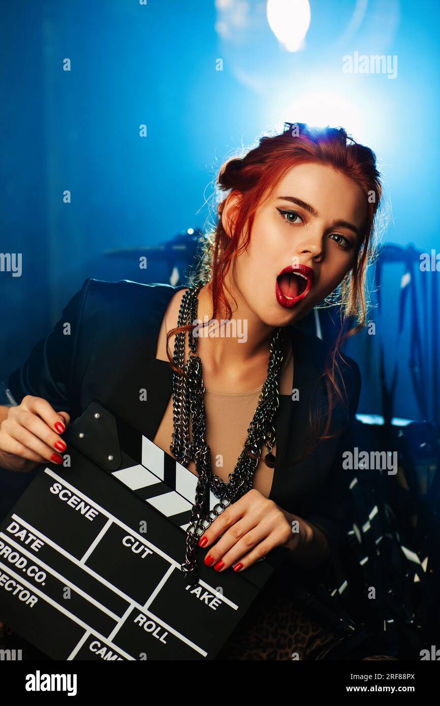 Girl with clapper hi-res stock photography and images - Alamy