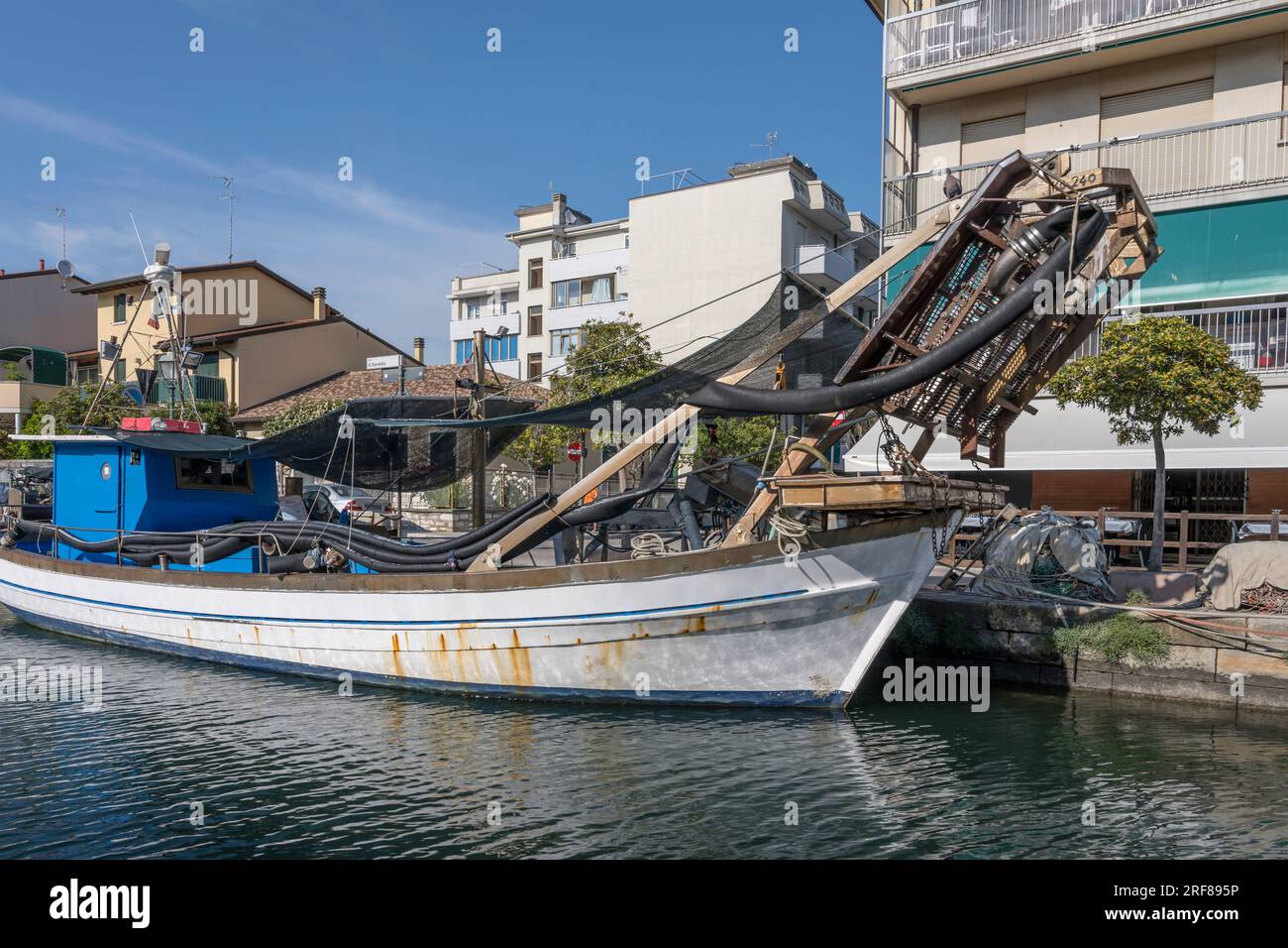 Clam boat hi-res stock photography and images - Alamy