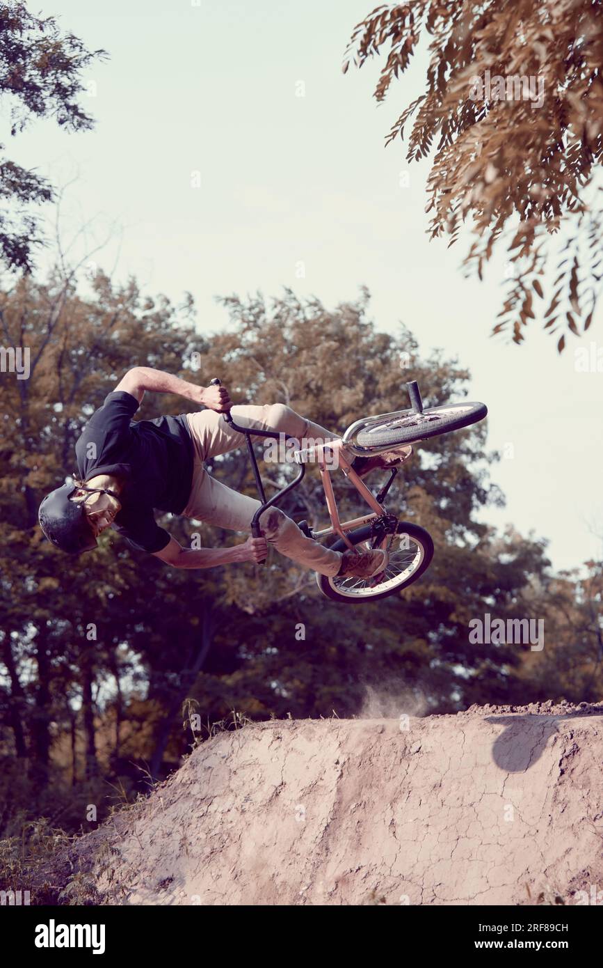 Boy riding his bmx in forest hi-res stock photography and images - Alamy