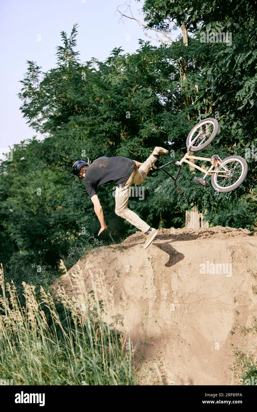 Boy riding his bmx in forest hi-res stock photography and images - Alamy