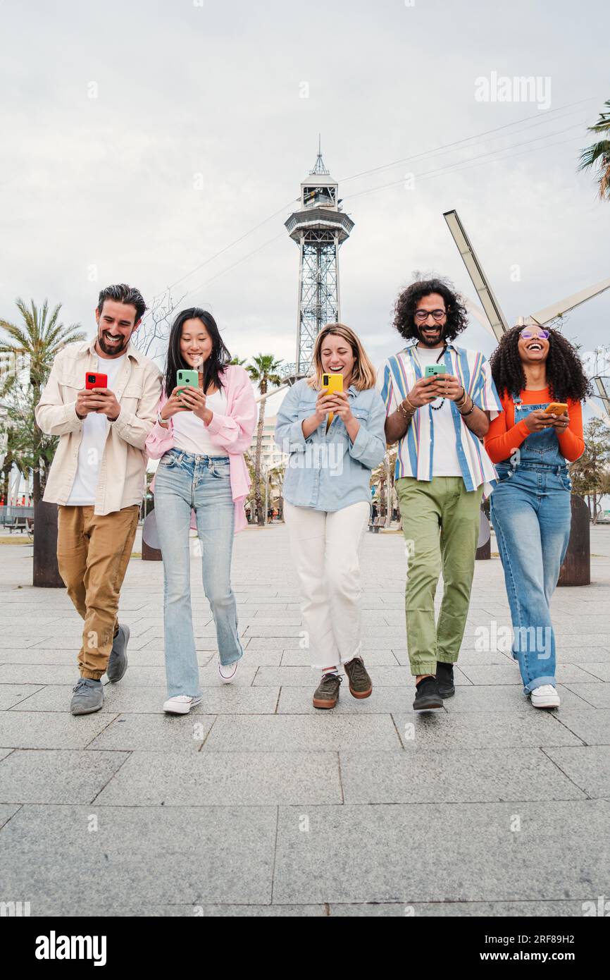 Group people chatting on cellphones hi-res stock photography and images ...