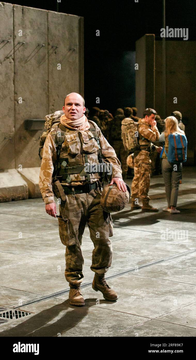 centre: Rory Kinnear (Iago) rear right: Jonathan Bailey (Cassio ...