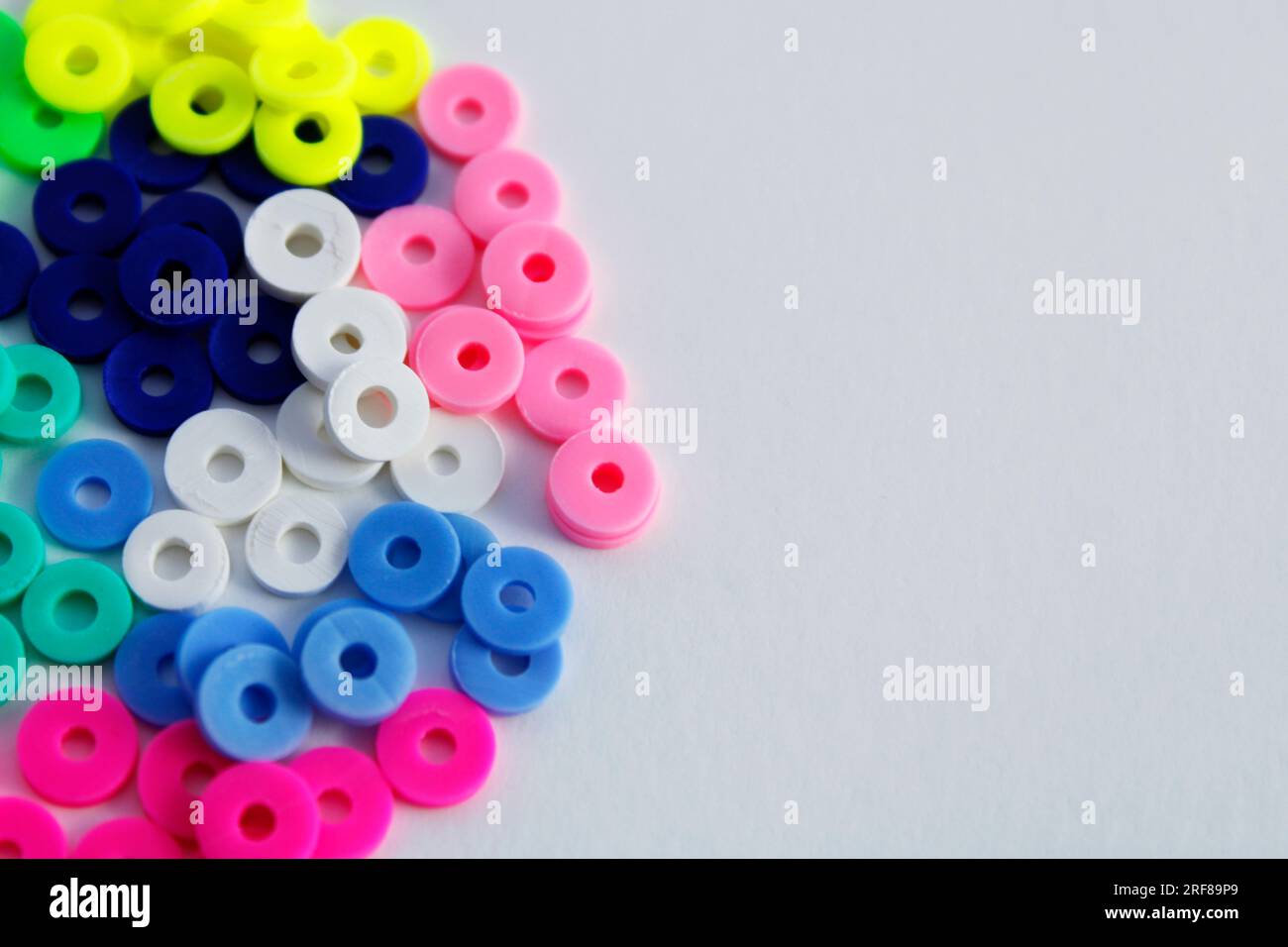 Polymer clay beads of various colors Stock Photo - Alamy