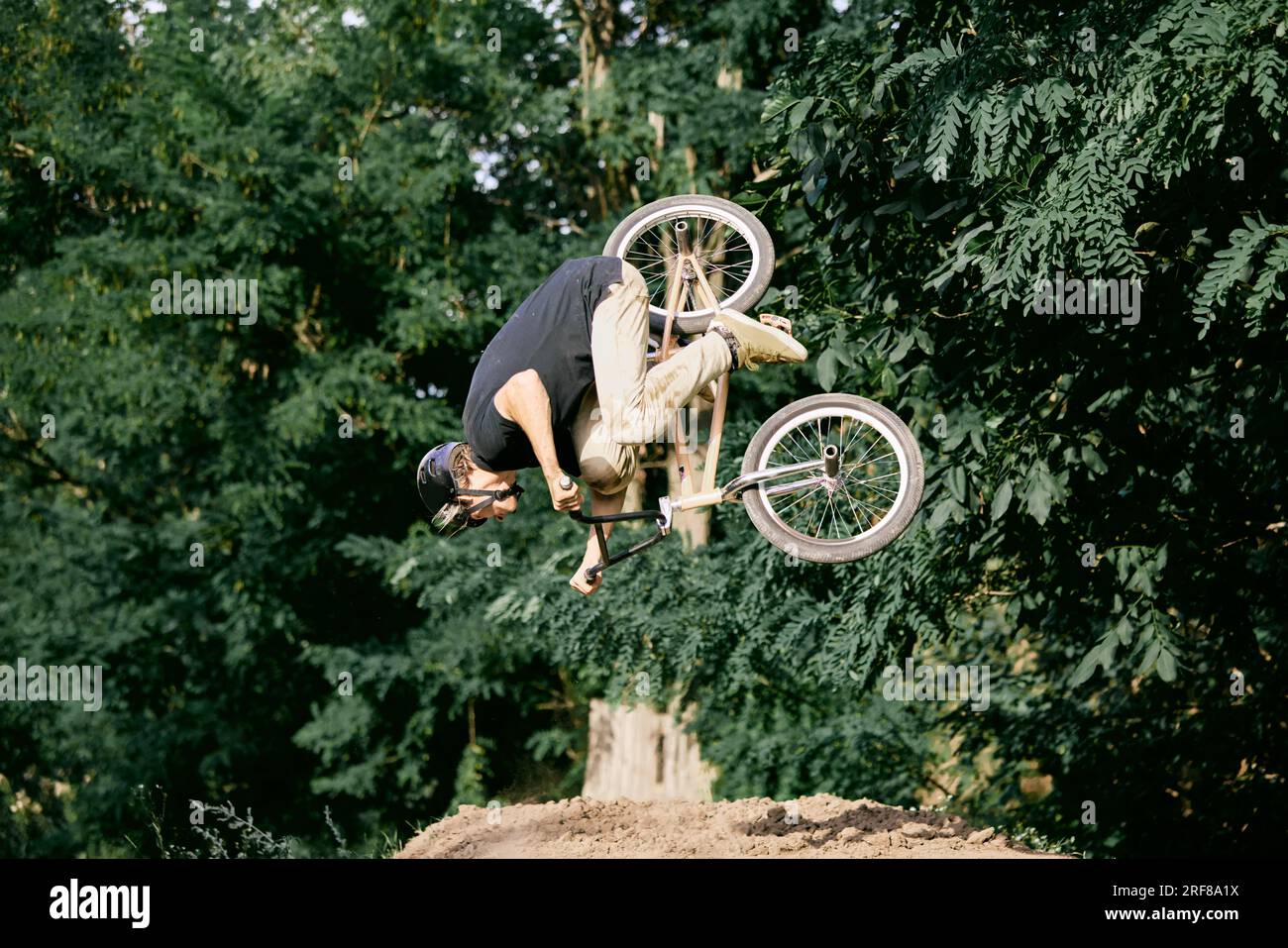 Boy riding his bmx in forest hi-res stock photography and images - Alamy