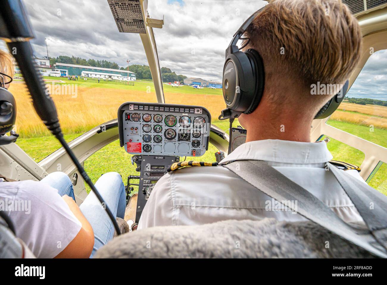 View through the front cockpit of a helicopter with details of ...
