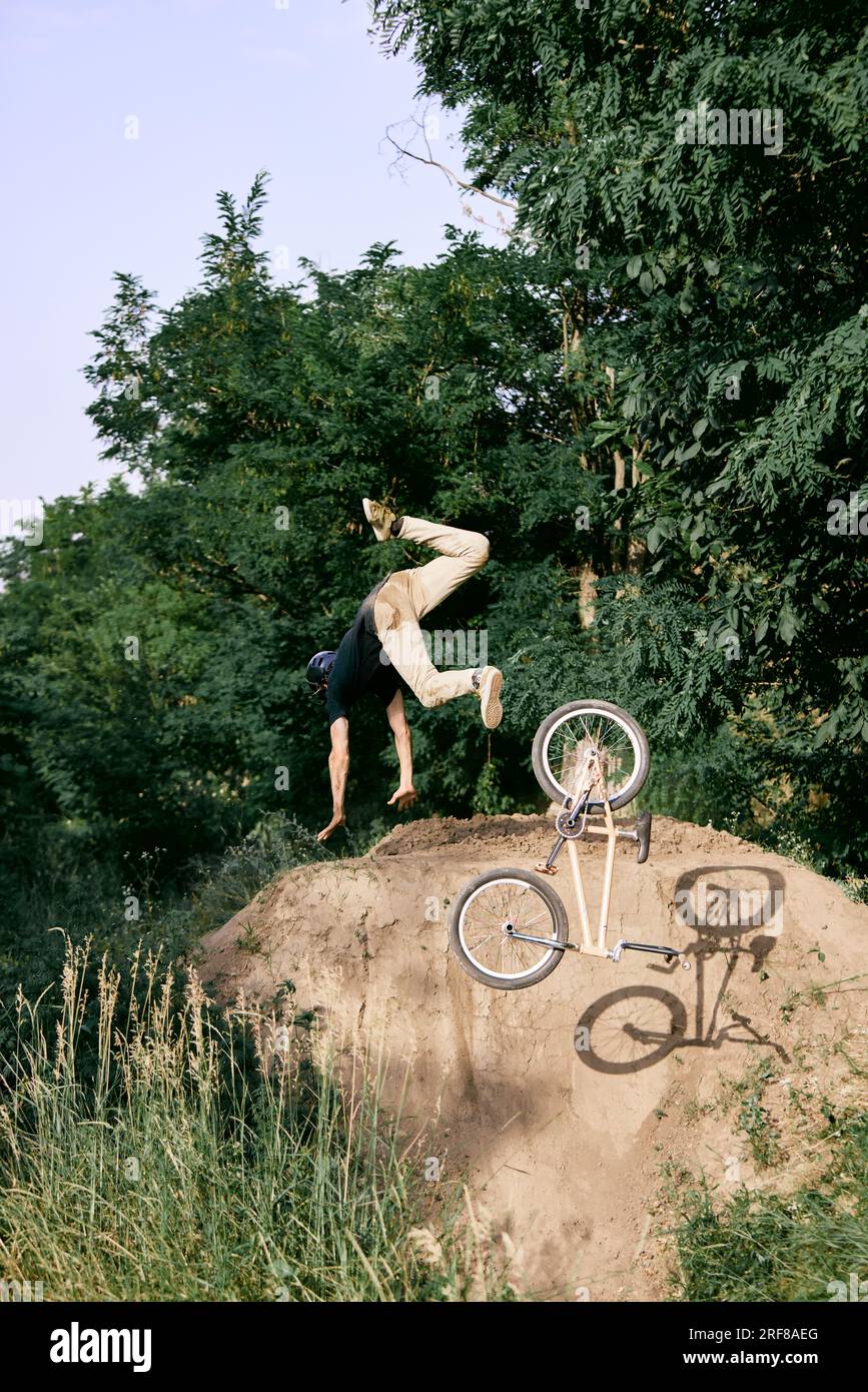 Boy riding his bmx in forest hi-res stock photography and images - Alamy