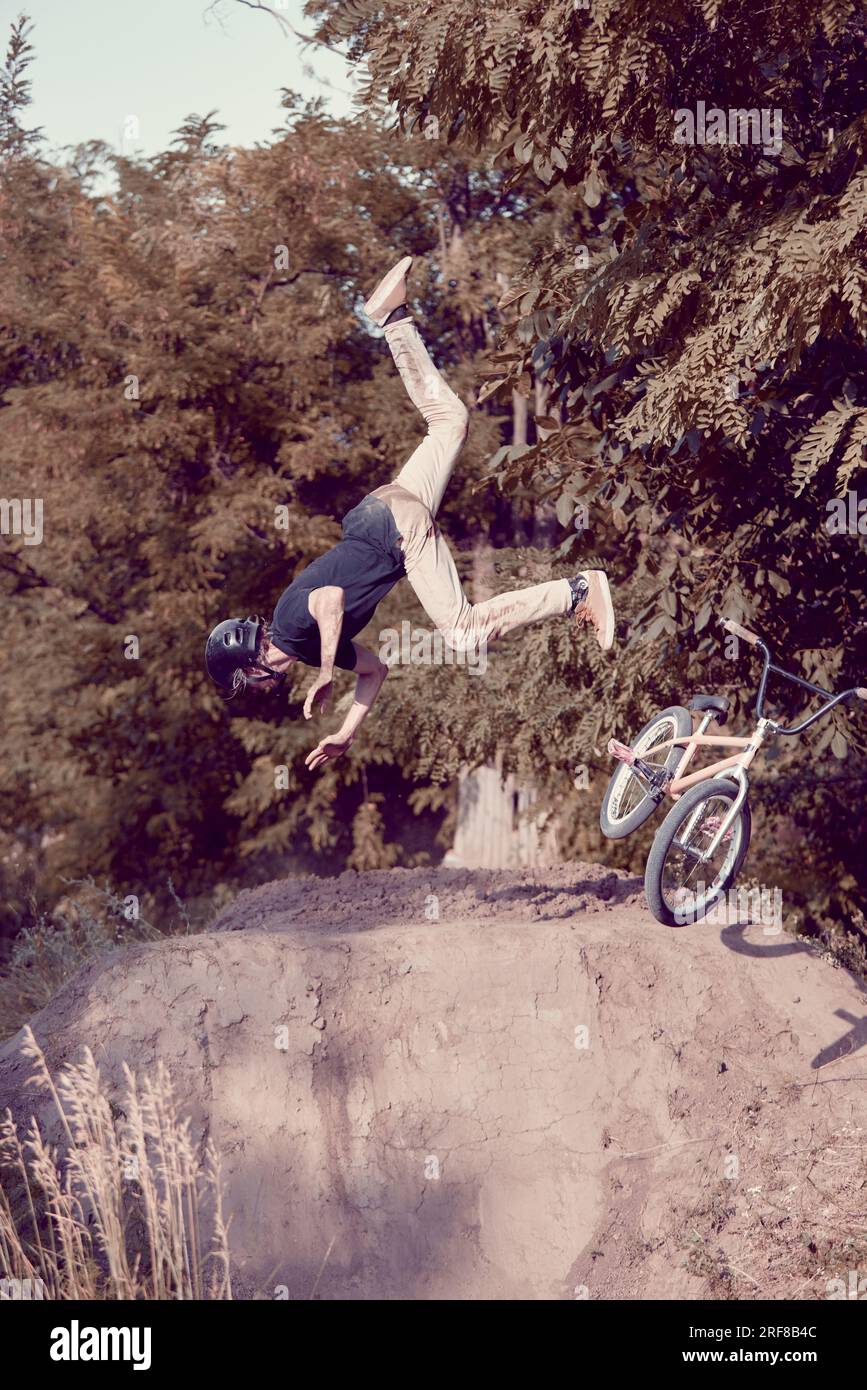 Boy riding his bmx in forest hi-res stock photography and images - Alamy
