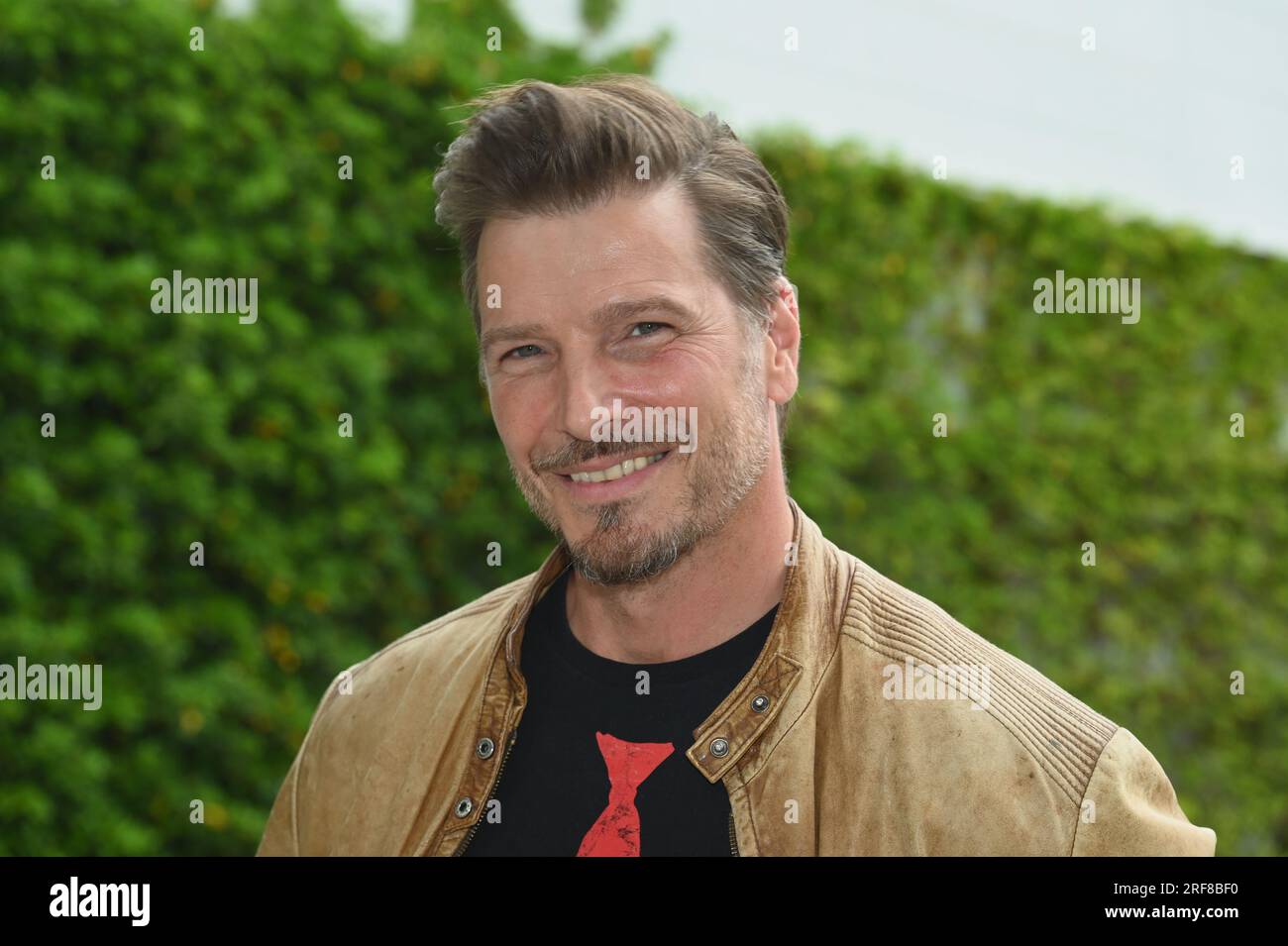 Cologne, Germany. 31st July, 2023. Actor Jan Ammann poses with the ...