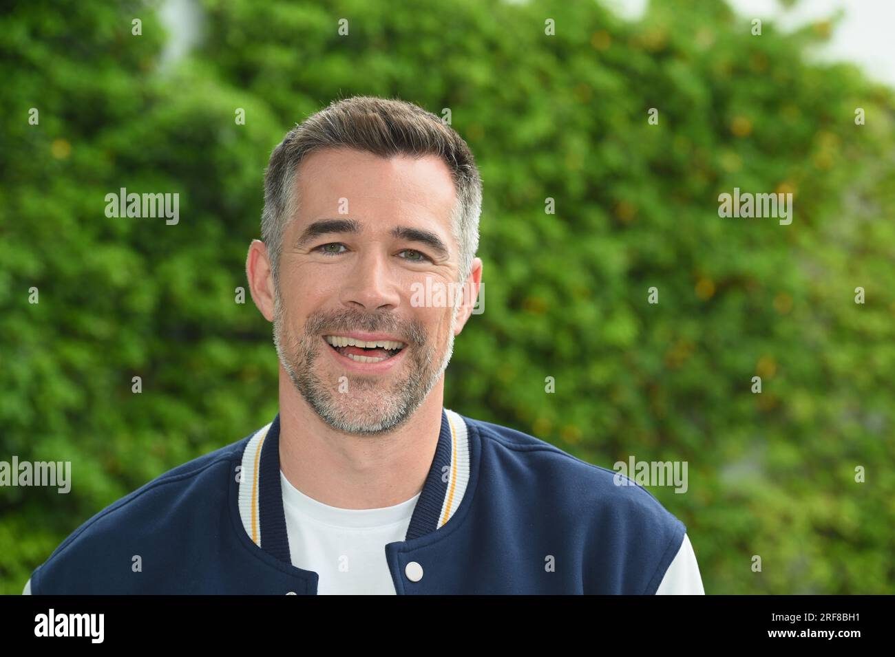 31 July 2023, North Rhine-Westphalia, Cologne: Actor Jo Weil poses with ...