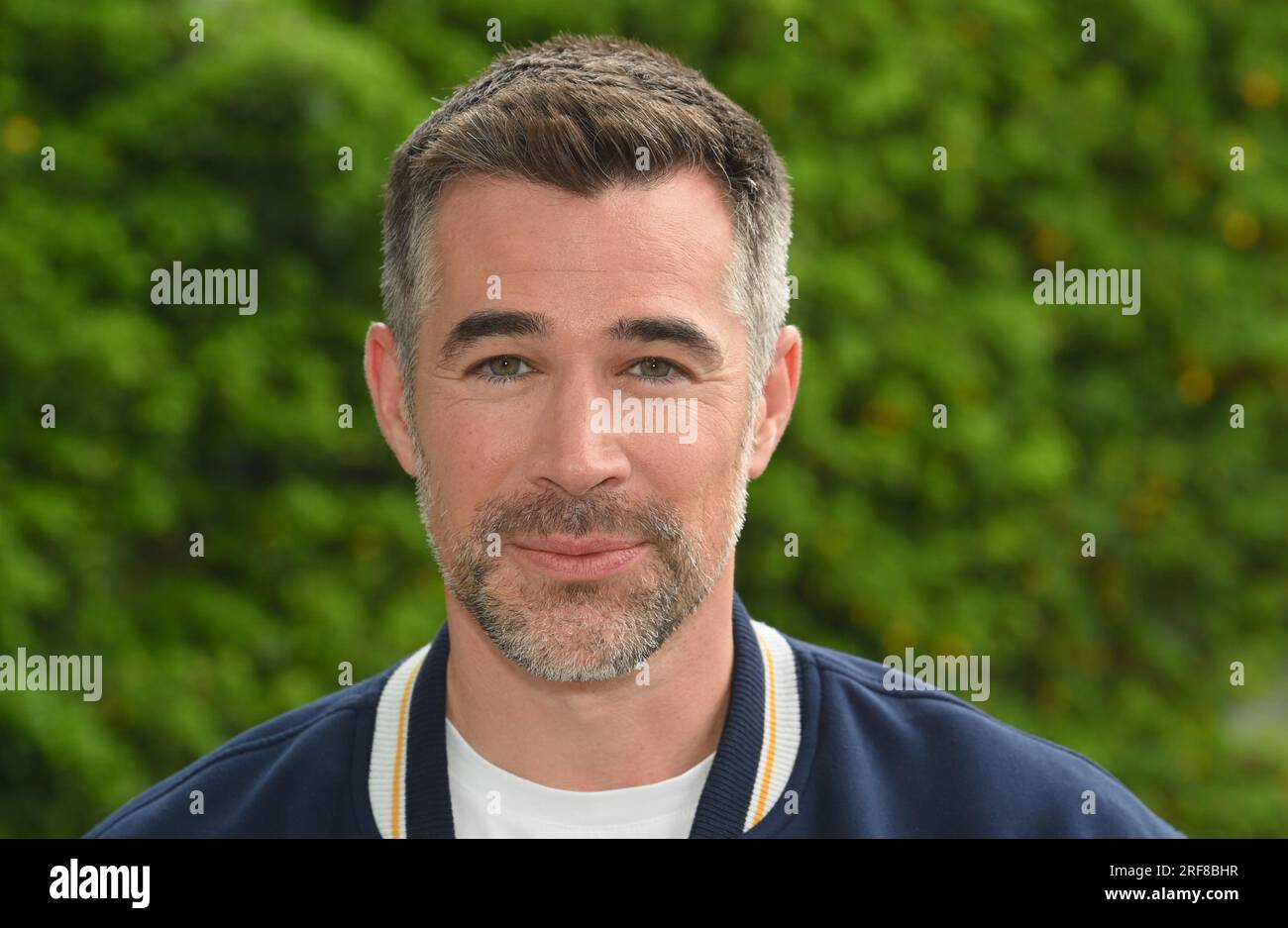 31 July 2023, North Rhine-Westphalia, Cologne: Actor Jo Weil poses with ...