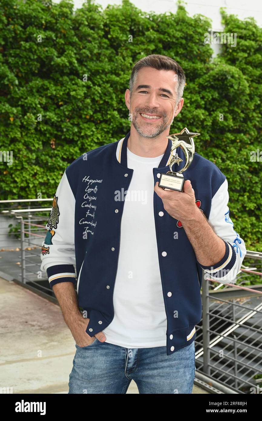 31 July 2023, North Rhine-Westphalia, Cologne: Actor Jo Weil poses with ...