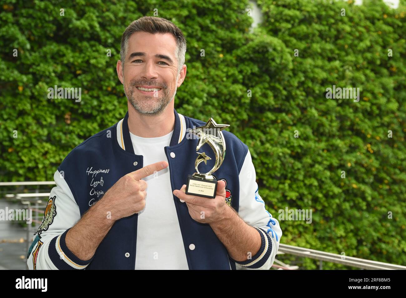 31 July 2023, North Rhine-Westphalia, Cologne: Actor Jo Weil poses with ...