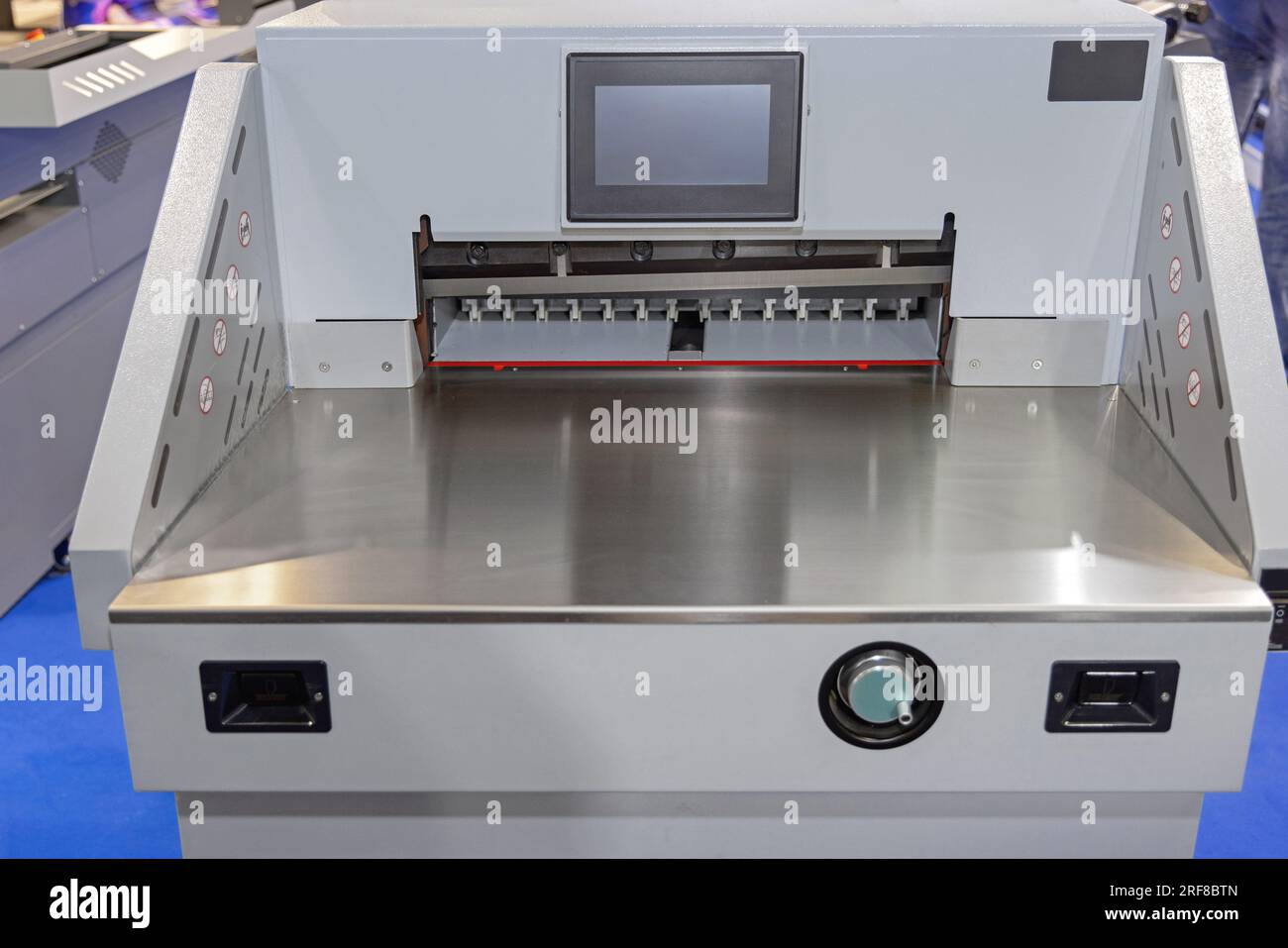 Modern Paper Cutter Machine in Print Office Equipment Stock Photo - Alamy