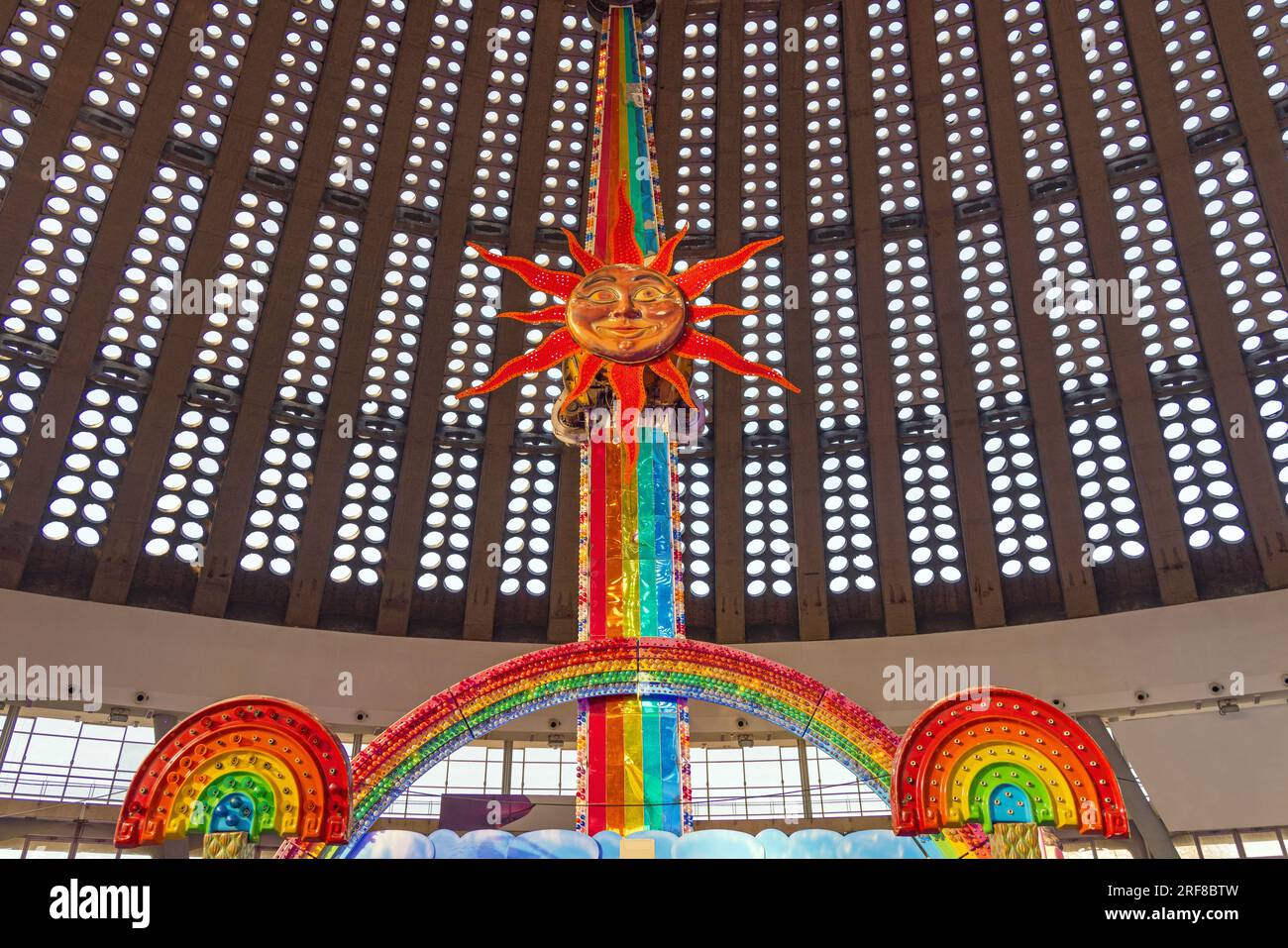 Sun Face at Rainbow Ride Amusement Park in Hall Stock Photo - Alamy