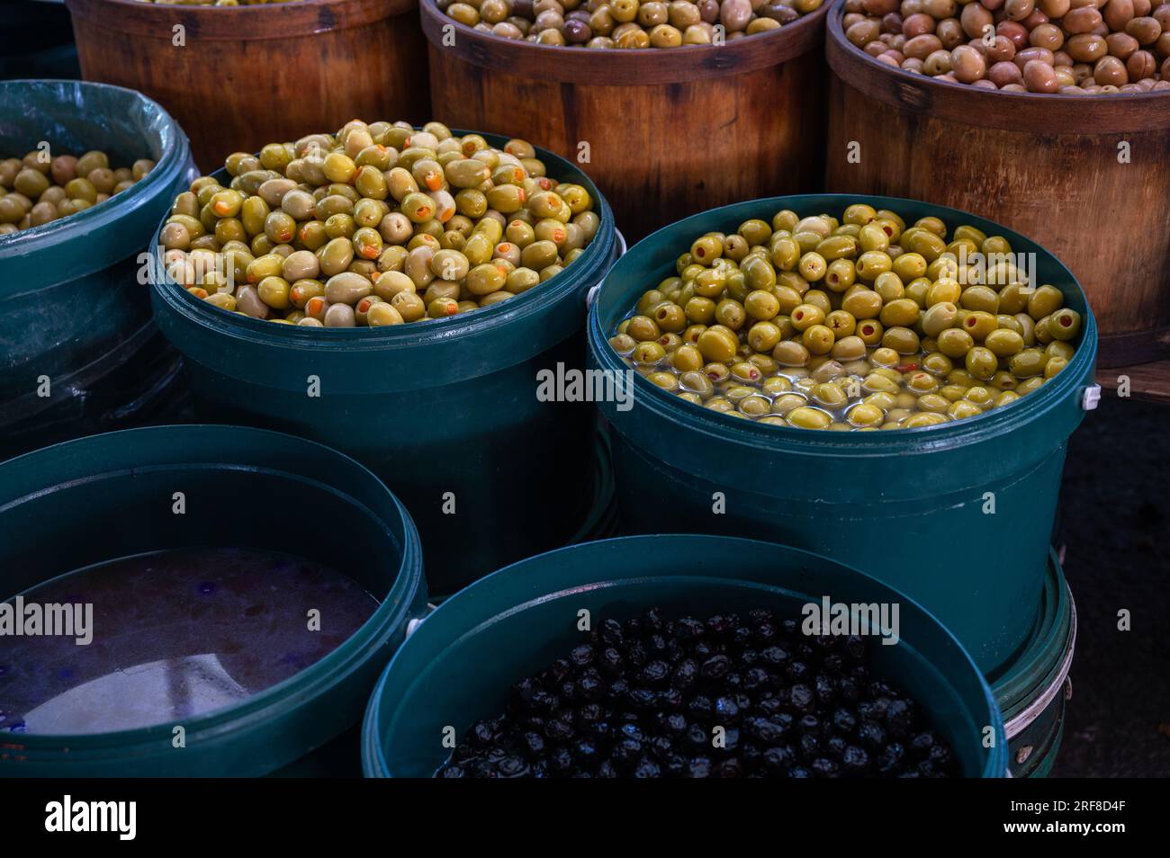Different olives sale in the traditional farm Turkish market, a counter ...
