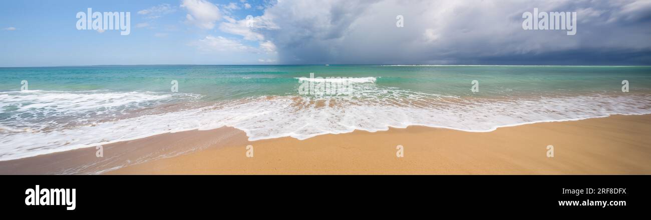 Beach on tropical island. Clear blue water, sand, clouds. Breathtaking ...