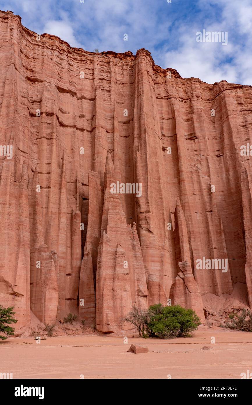The spires of the Gothic Cathedral in the eroded red sandstone wall in Talampaya National Park ...