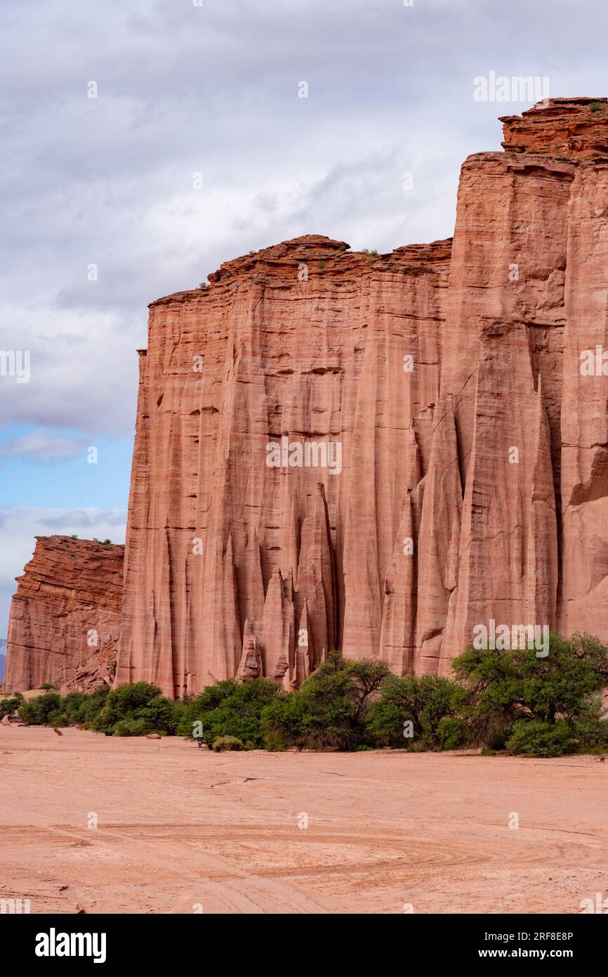 The eroded red sandstone wall of the Triassic Talampaya Formation in ...