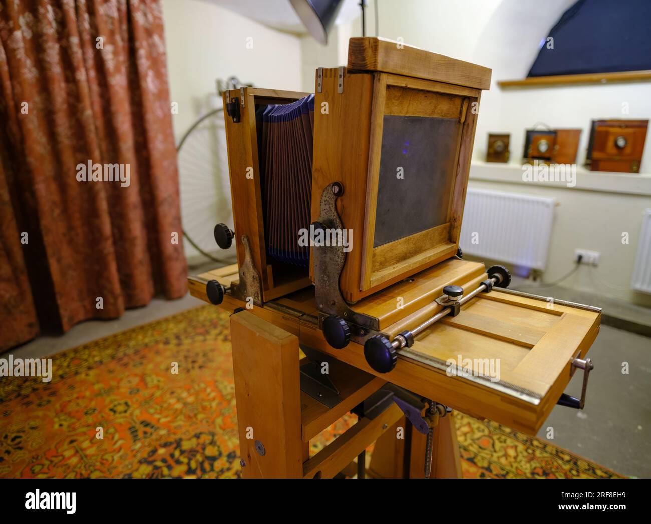 Vintage antique retro old camera on wooden tripod hi-res stock ...