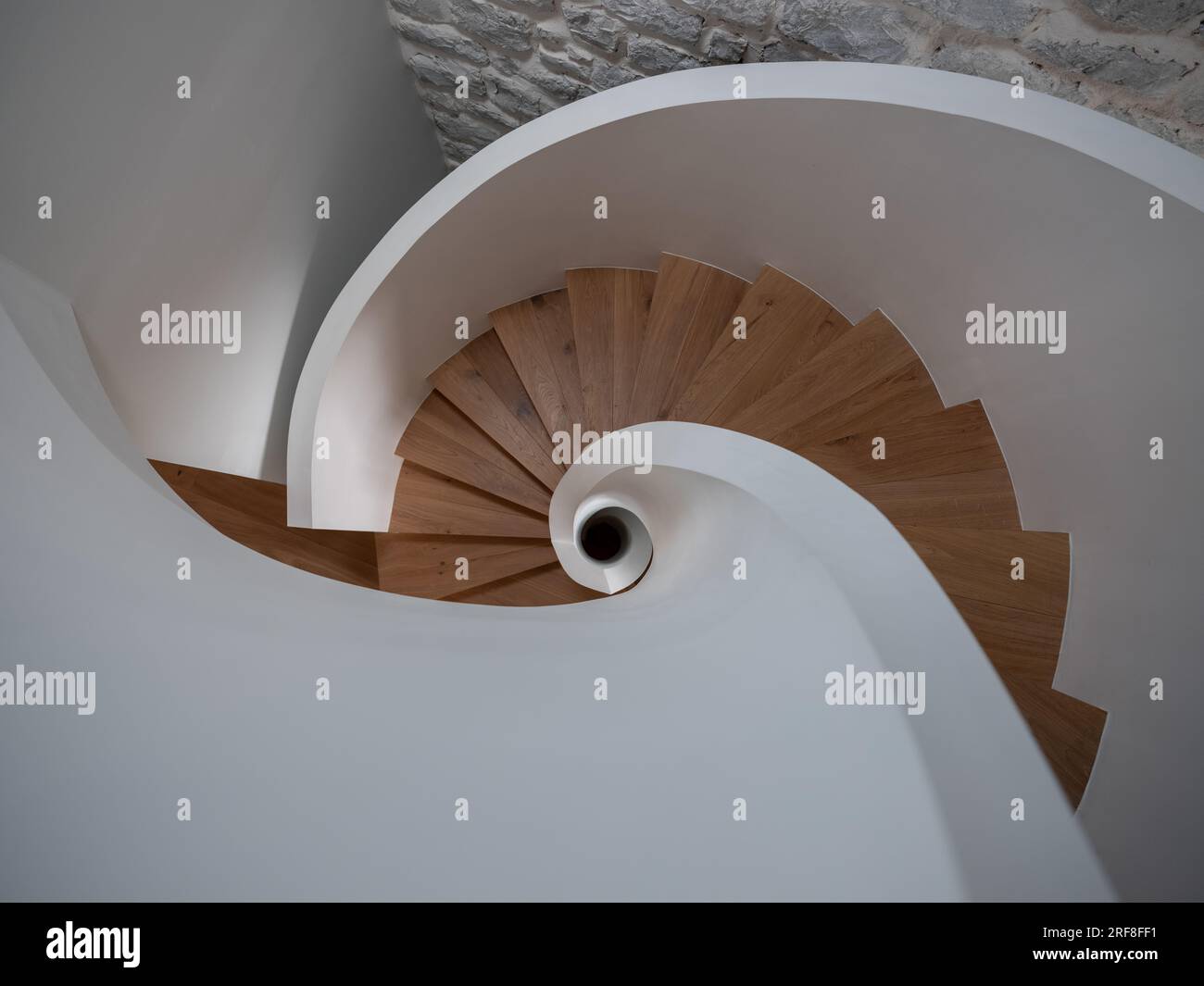 A view from above of a spiral staircase Stock Photo - Alamy
