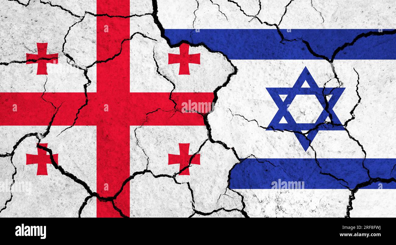 Flags of Georgia and Israel on cracked surface - politics, relationship ...