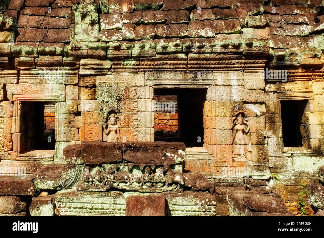 A fragment of an ancient wall made of building blocks, Khmer bas ...