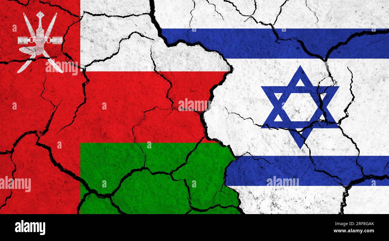 Flags of Oman and Israel on cracked surface - politics, relationship ...