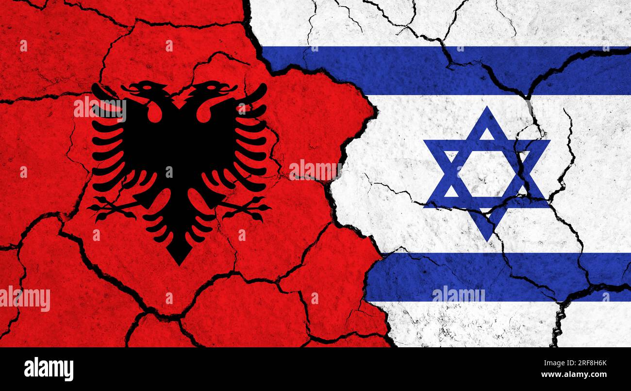 Flags of Albania and Israel on cracked surface - politics, relationship ...