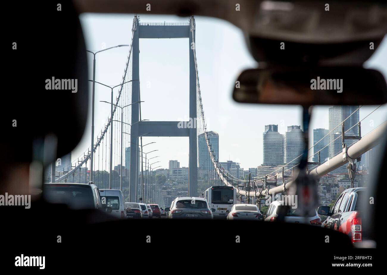 Traveling west in a taxi across the Bosphorus Bridge which connects the ...