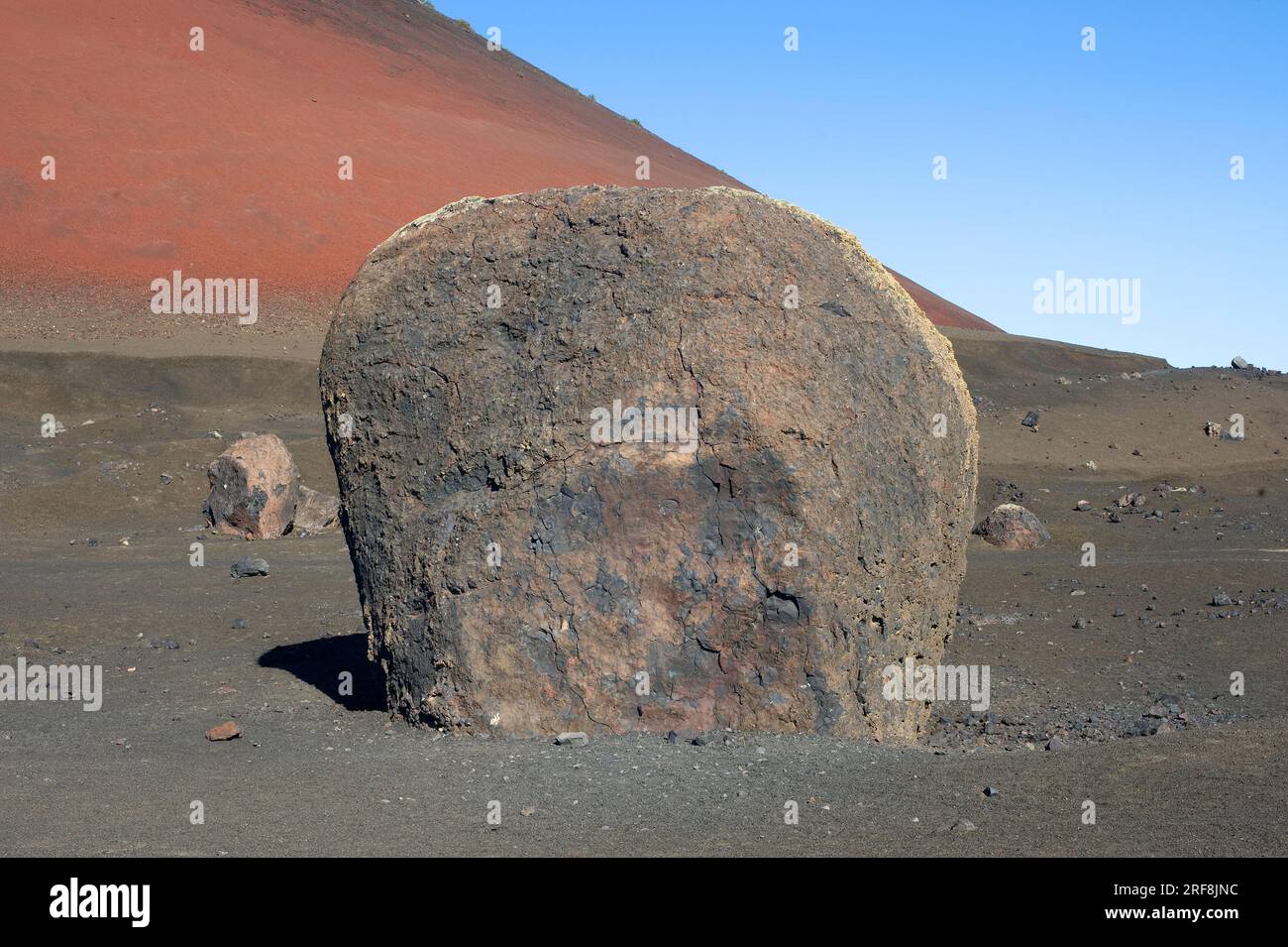 Giant volcanic bomb. Montaña Roja Volcano, Lanzarote Island, Canary ...