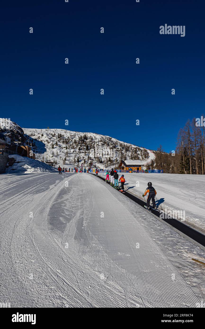 Falcade, Italy - February 15, 2023: Mountain station of a ski lift in ...