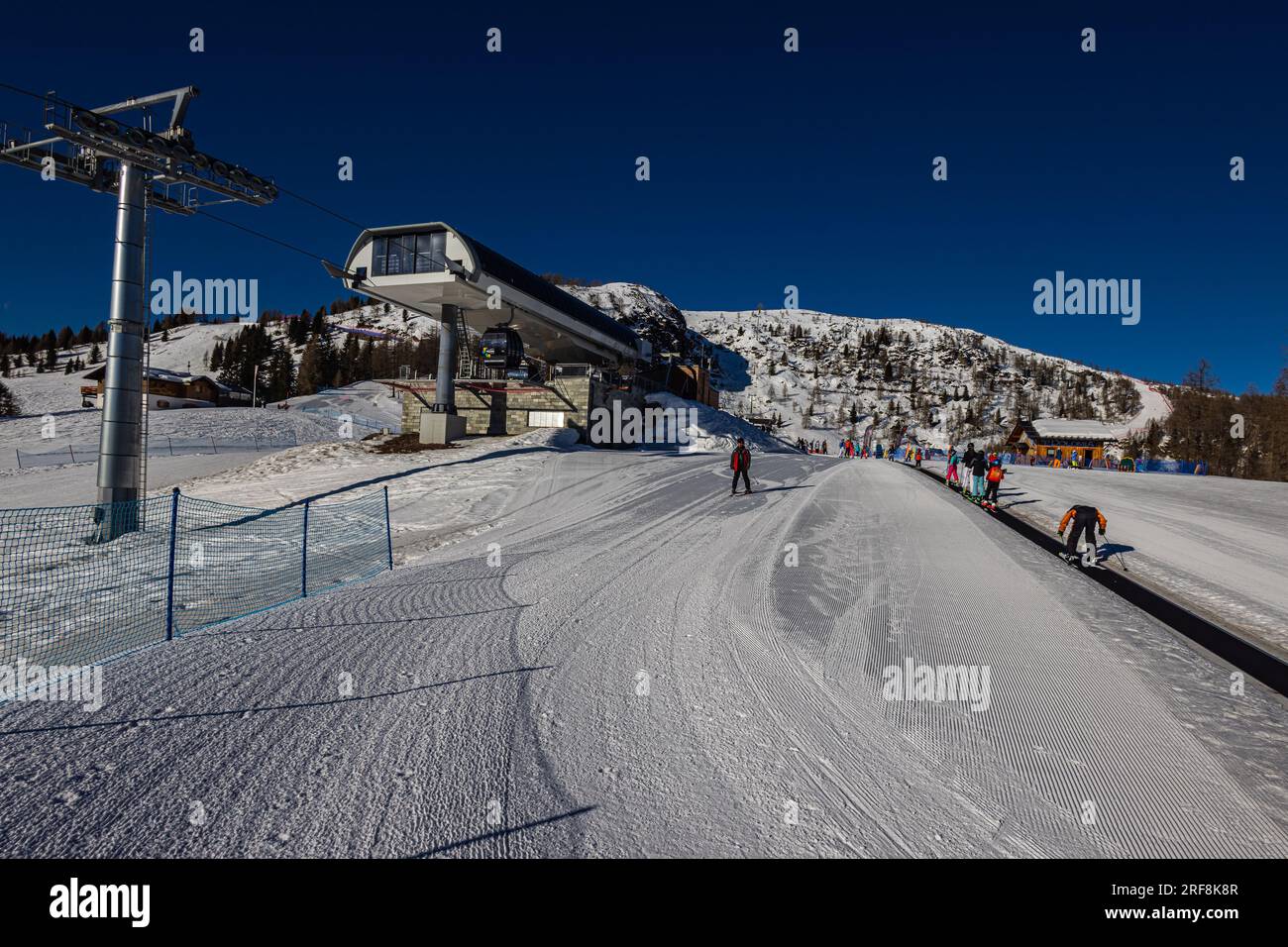 Falcade, Italy - February 15, 2023: Mountain station of a ski lift in ...