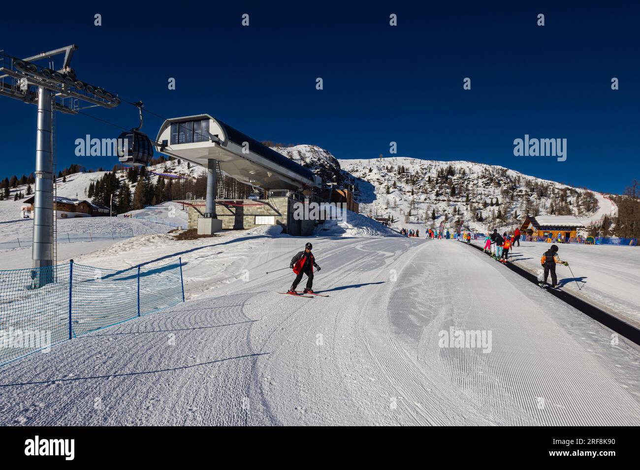 Falcade, Italy - February 15, 2023: Mountain station of a ski lift in ...